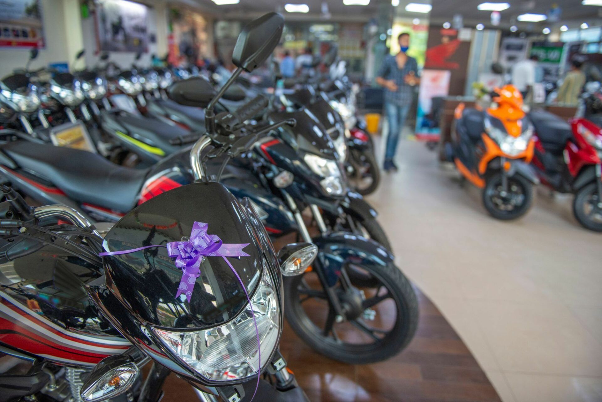 Two-Wheeler Loan Tenure: Factors, Tips & How to Choose the Best One